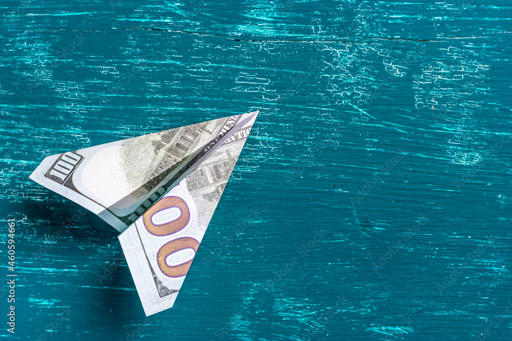 Paper plane. Airplane folded from dollar banknotes. Stock Photo | Adobe ...