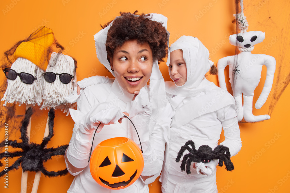 Scary halloween mummies have fun fun together holds pumplin lantern and ...