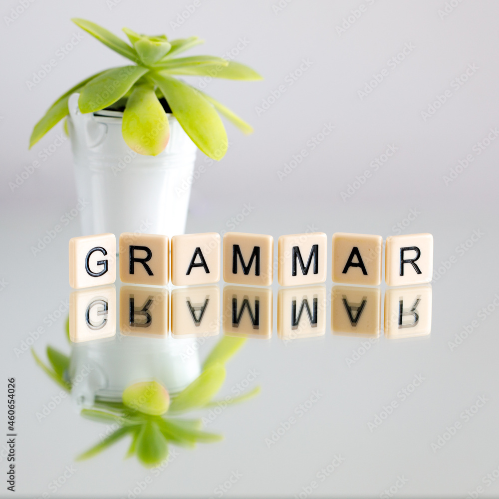 grammar. Language, knowledge and self-education concept. Wooden letters ...