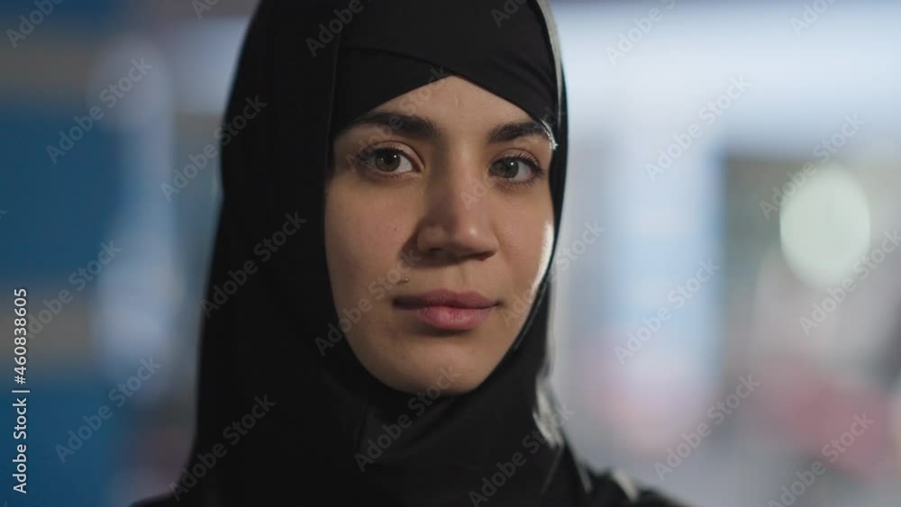 Headshot portrait of charming confident Middle Eastern woman in black ...