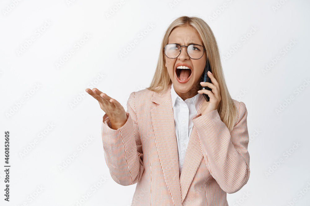 Angry office lady shouting, having an argument on phone, screaming and ...