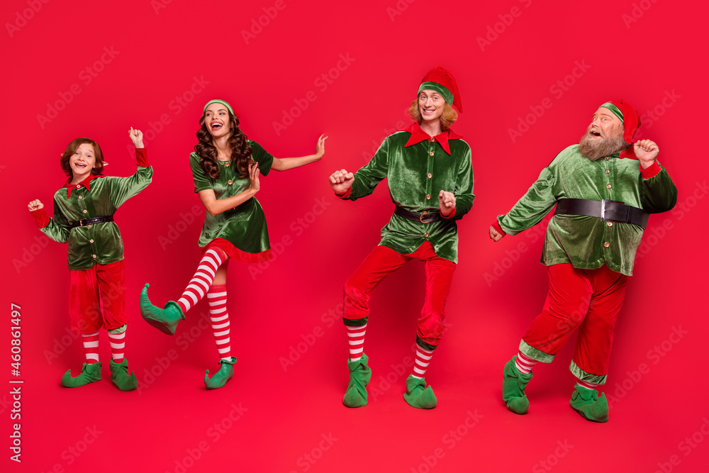 Full body photo of positive childhood elf people dance xmas wear hat ...