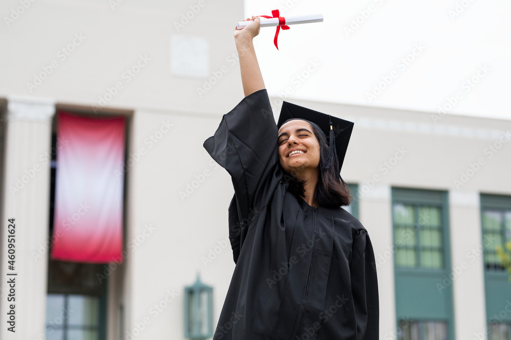 Girl graduating high school, celebrating academic achievement Stock ...