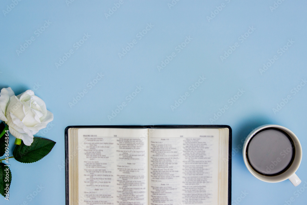 Holy bible with white roses and coffee over the blue table. Stock Photo ...