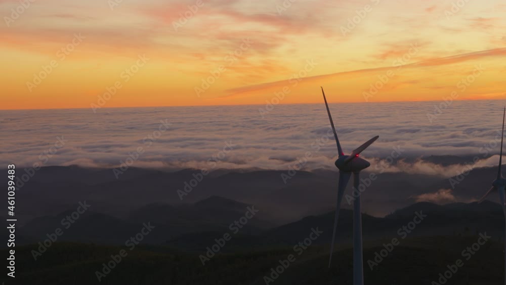 Video „Static shot with copy space of wind turbines turn slowly in epic ...