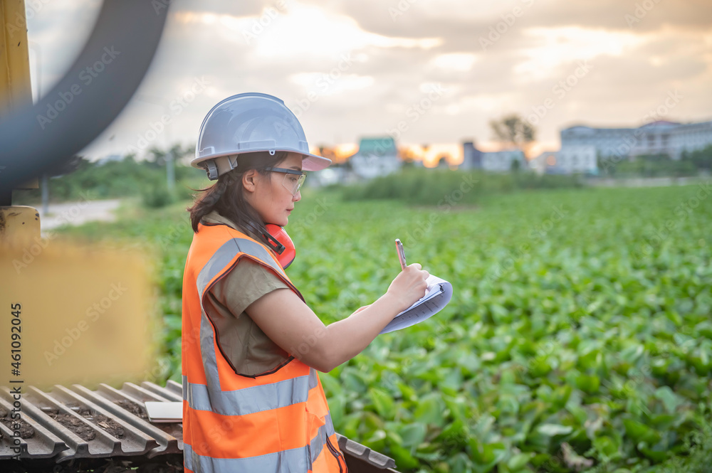 Environmental engineers work at the water storage plant, check the pH ...