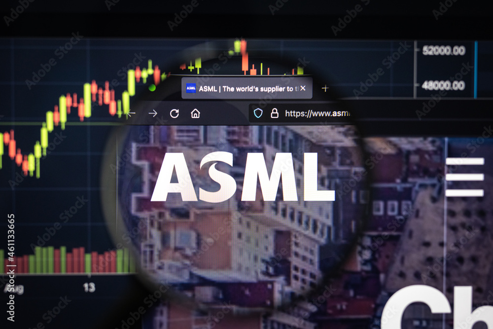 ASML company logo on a website with blurry stock market developments in ...