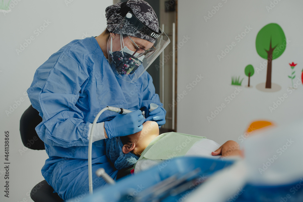 Dentist making a dental check Stock Photo | Adobe Stock