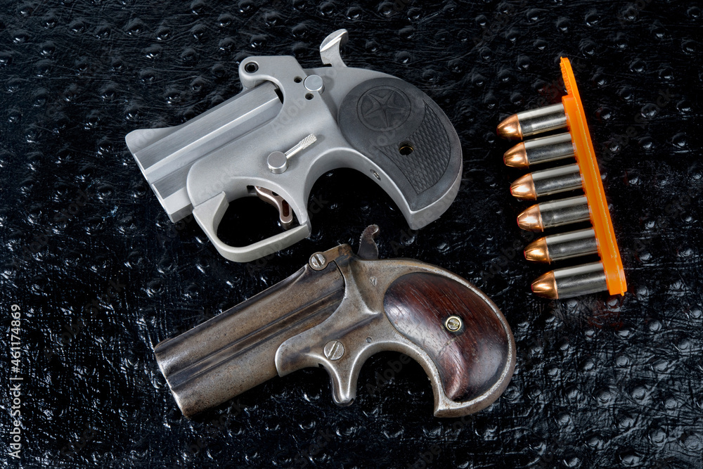 Antique Derringer and modern Derranger Stock Photo | Adobe Stock