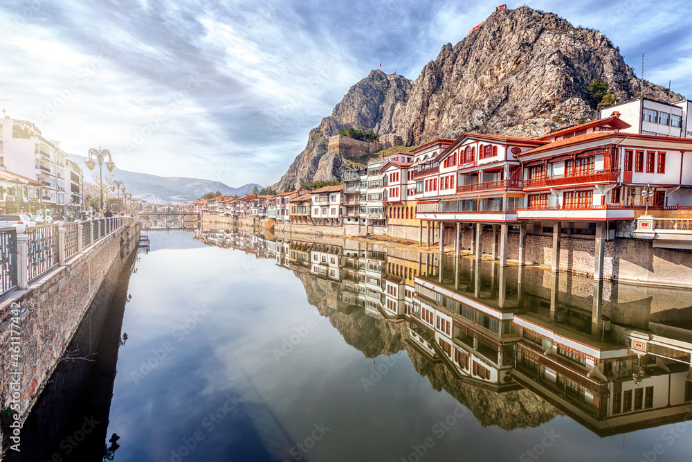 Landscape of historical houses, clock tower and Green River (Turkish ...