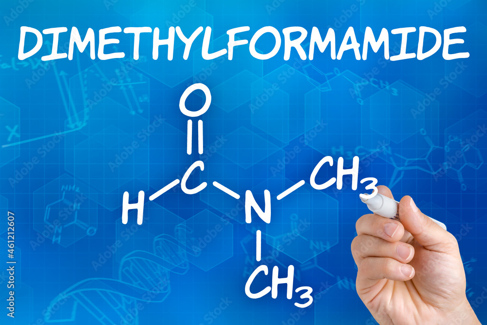 Hand with pen drawing the chemical formula of Dimethylformamide Stock ...