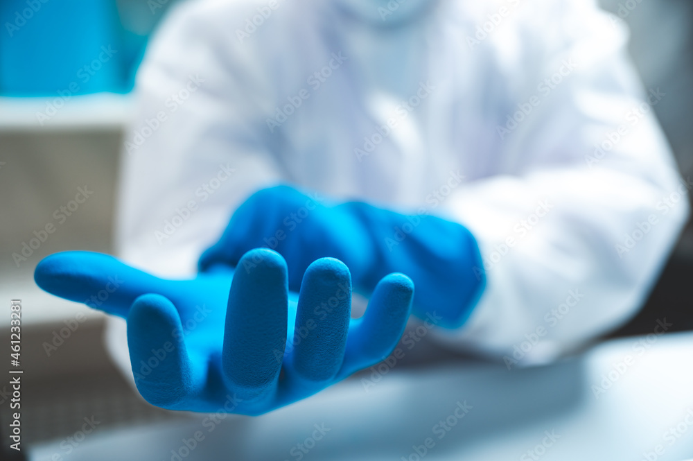 Closeup of hands of a young unrecognizable scientist, researcher and ...