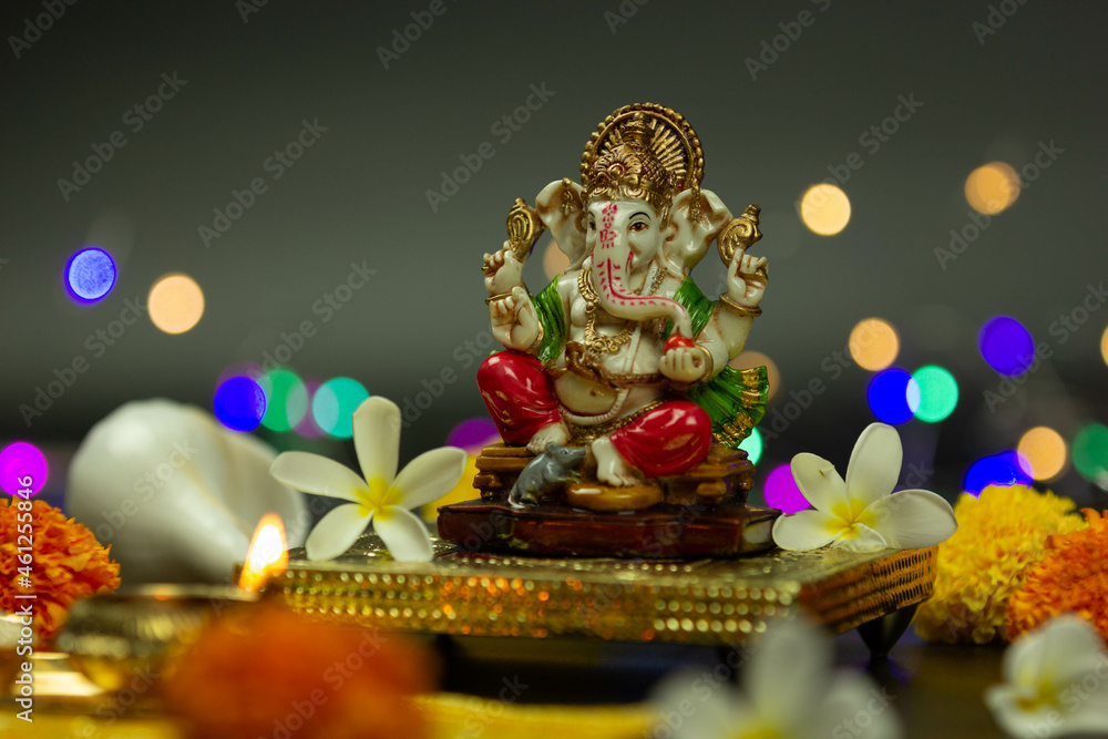 Side view of Statue Of Ganpati Bappa Hindu God Ganesha Sitting On ...