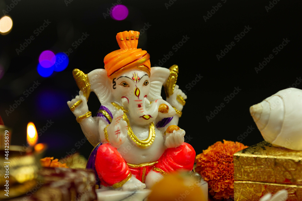 Murti or Moorti Of Ganpati Bappa Morya Hindu God Lord Ganesha In Orange ...