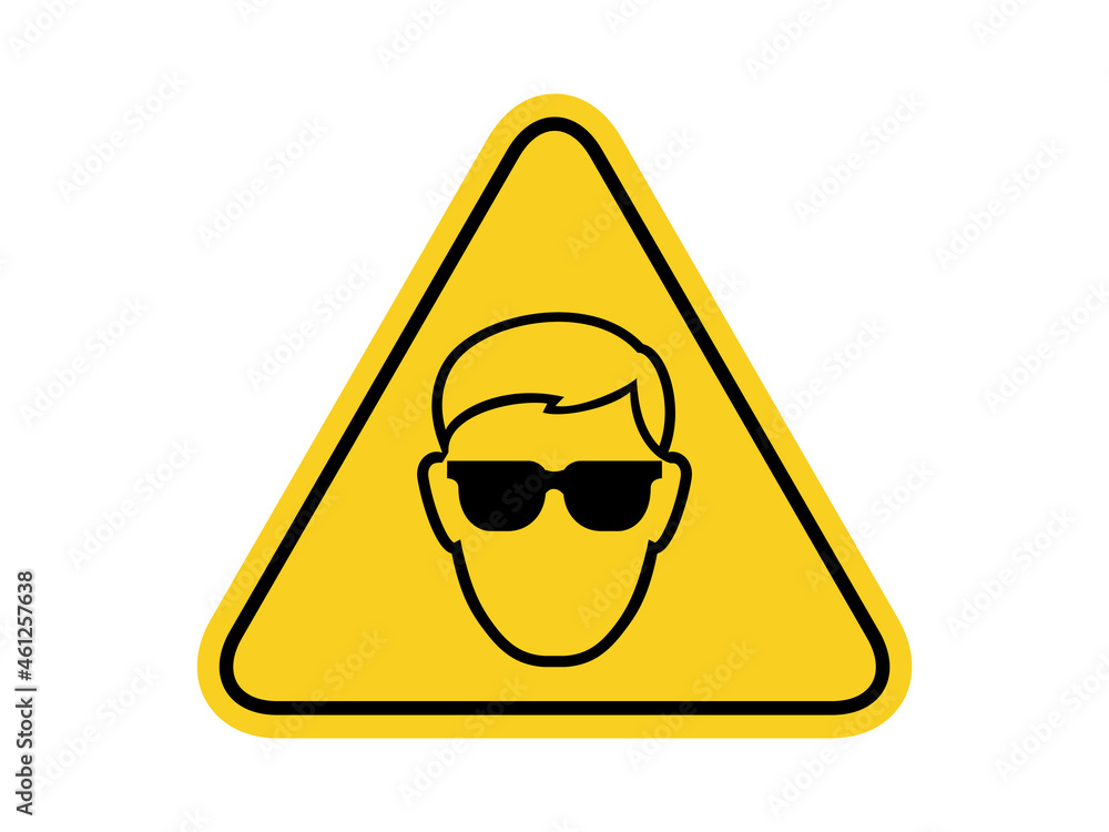 isolated requiring safety glass, common hazards symbols on yellow round ...