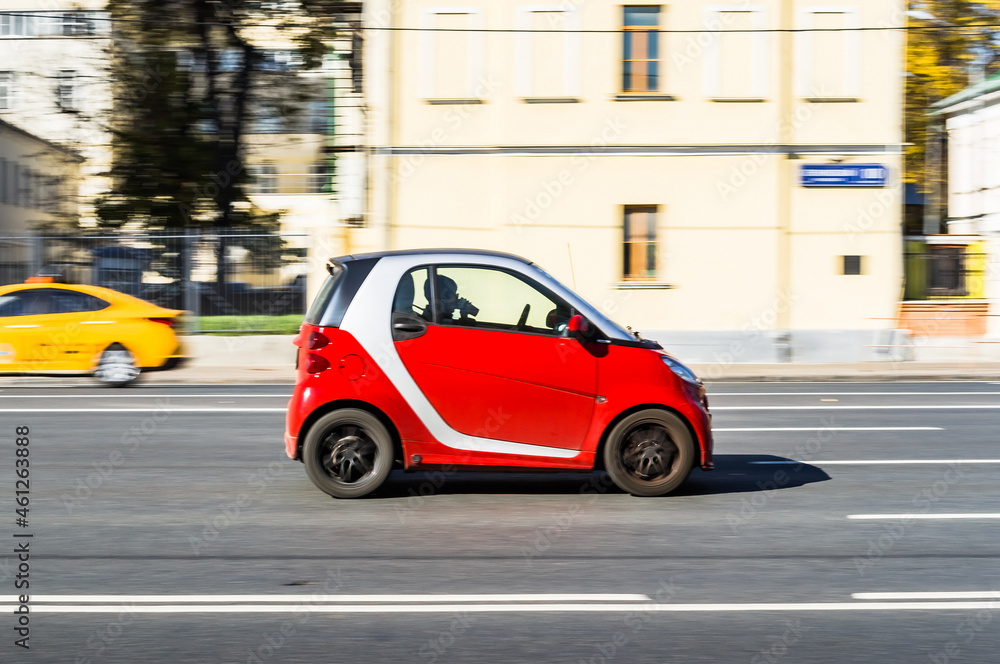 Smart Fortwo Second generation (W451) driving on street at high speed ...