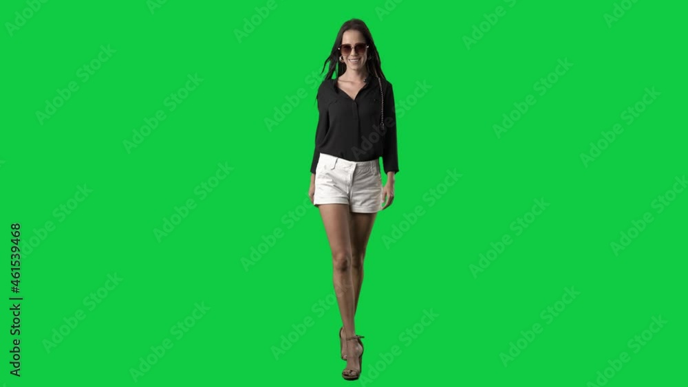 Slow motion of slim fashion model with sunglasses walking flying long ...