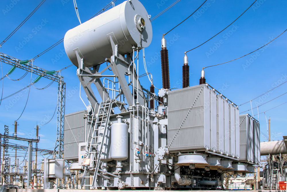 Powerful power transformer for industrial high voltage substation. Energy enterprise. Stock ...