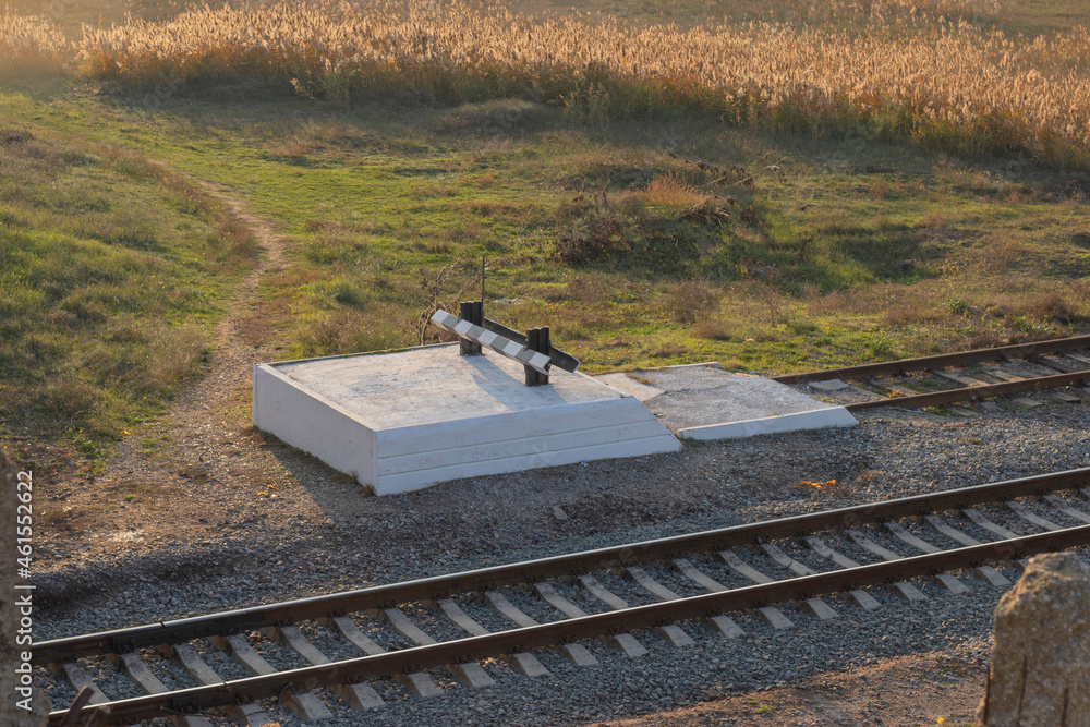 Dead-end stop of railway track. Railway dead end with stop in form of ...