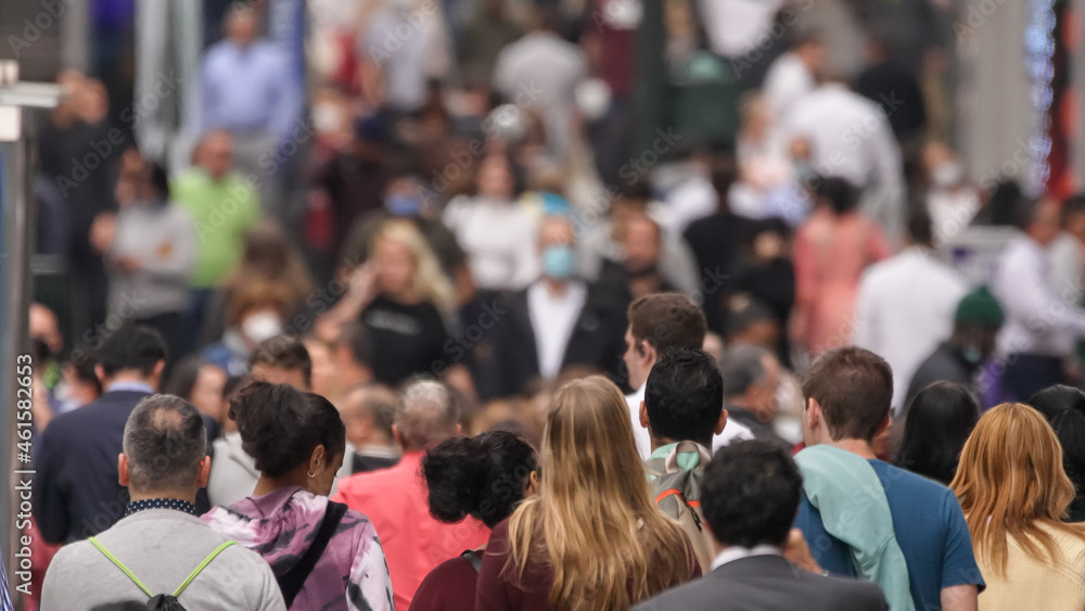 Crowd of people walking street in New York City back view from behind ...