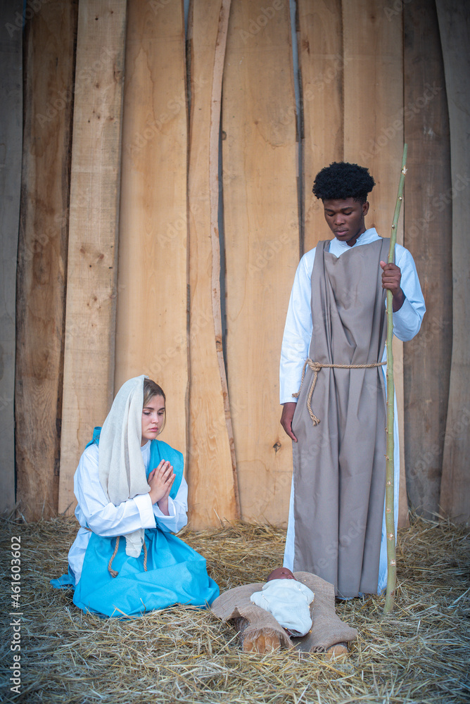 Vertical nativity scene with multi-ethnic characters in a crib Stock ...