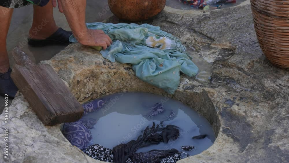 Vidéo Stock Close Up Of A Woman Soaping Up Her Laundry At A Traditional