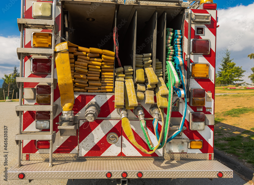 Modern Fire Track. Back view of the fire truck, hoses and equipment ...