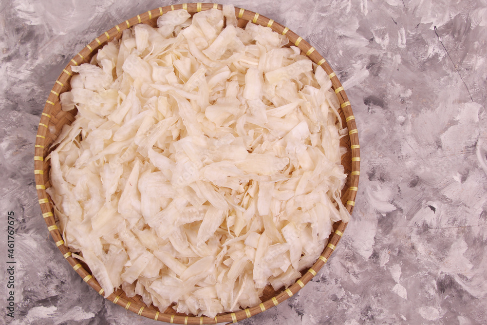 Mangleng is chips made from cassava slices. cassava pieces are stacked ...