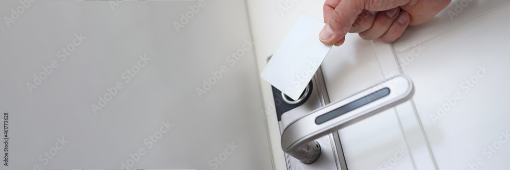 Man applying plastic card to door lock to open closeup Stock Photo ...