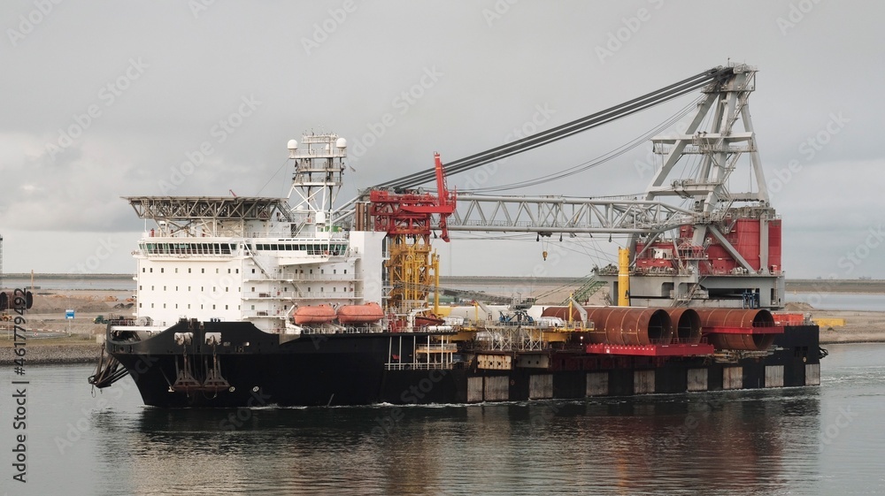 Offshore heavy lift vessel with the cargo of wind turbines Stock Photo ...