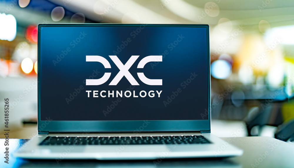 Laptop computer displaying logo of DXC Technology Stock Photo | Adobe Stock