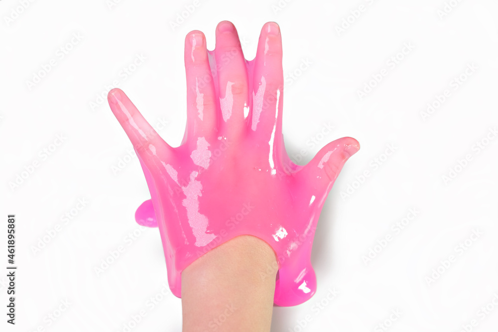 Hand Playing with textured slime with bubbles, stretching the gooey ...
