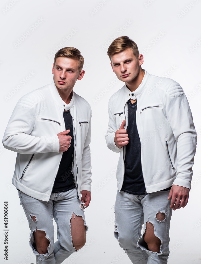 Guys wear casual outfit. young confident brothers. confident fashion ...