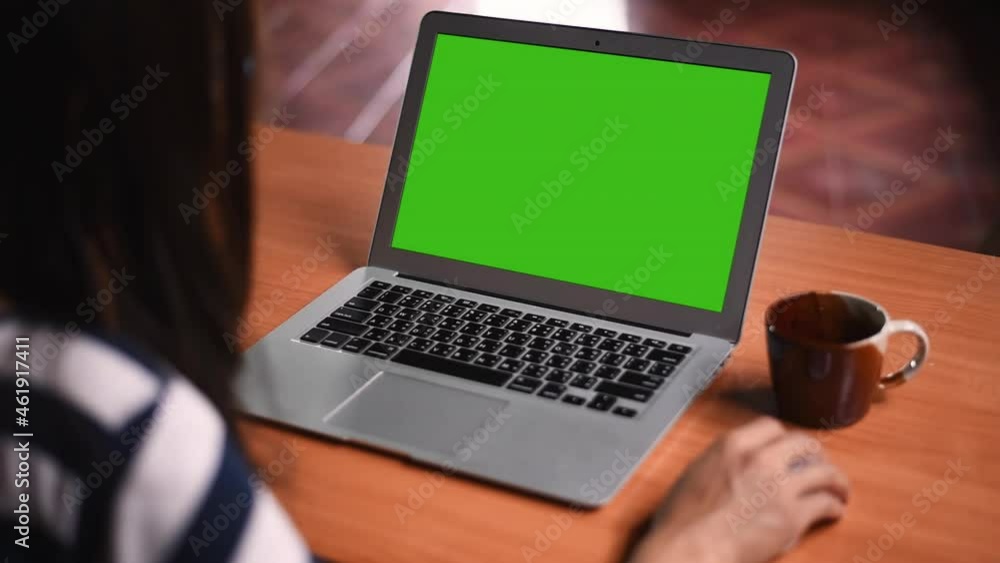 4K Over the shoulder shot of a business woman working in office ...