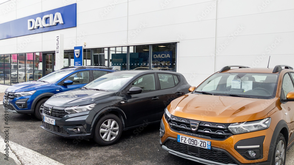 Dacia sign brand and text logo on building facade car dealership shop ...