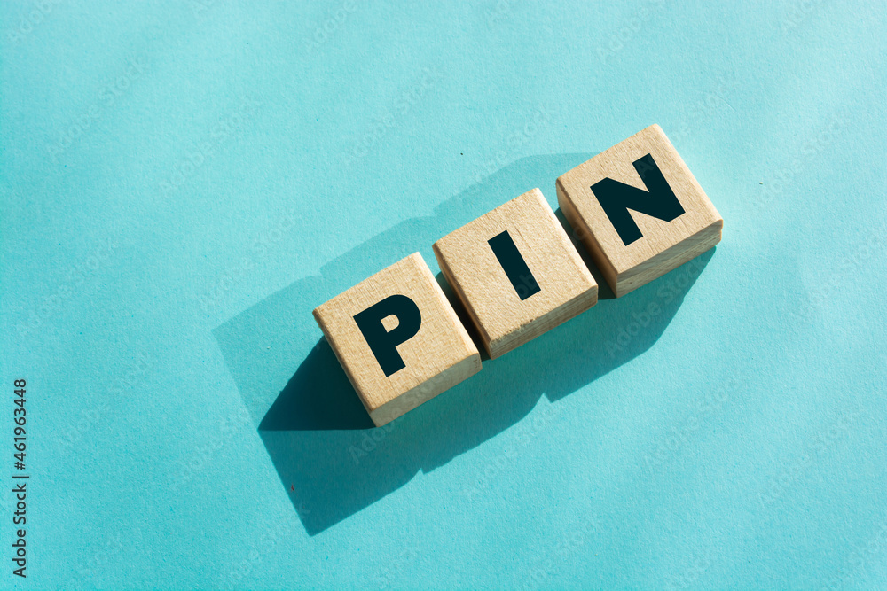 Word PIN -Personal identification number. Wooden small cubes with ...