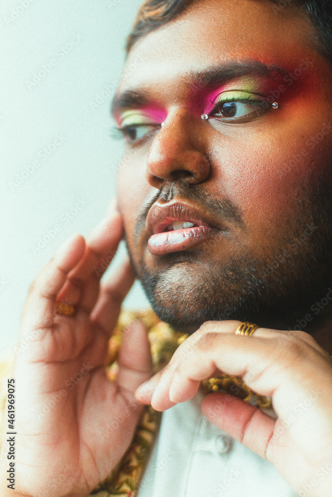 portrait of dark skinned Indian man against white wall Stock Photo ...