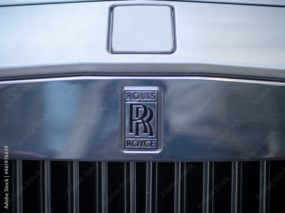Silver logo of a refined Rolls Royce on the front of the car Stock ...