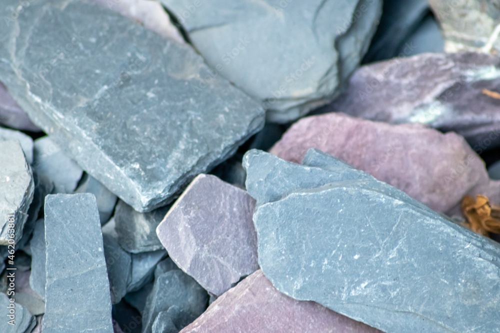 Raw rocks and minerals as natural stones background with crushed and ...