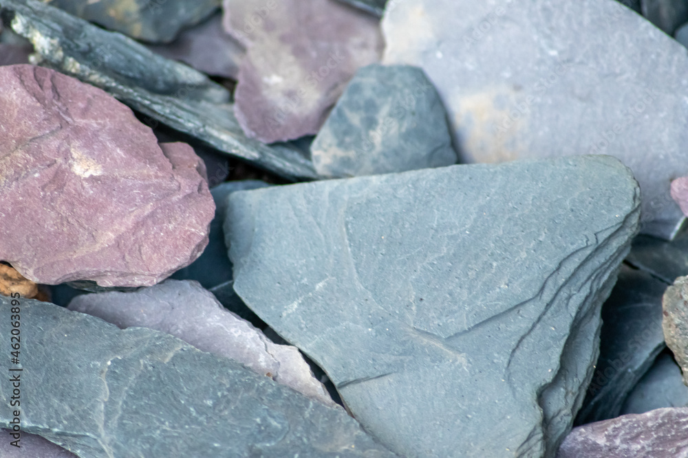 Raw rocks and minerals as natural stones background with crushed and ...