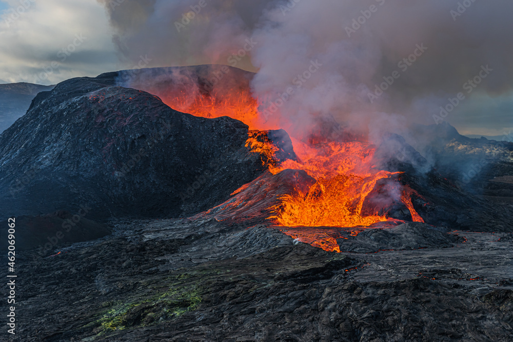 Daytime volcanic eruption on Reykjanes peninsula. Side view of the ...