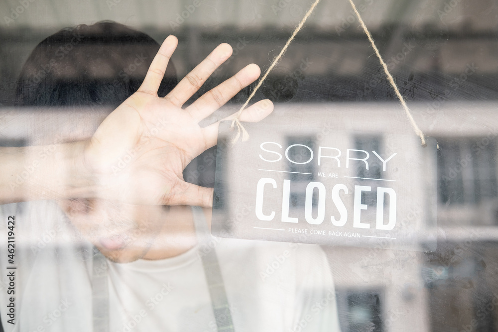 Asians with sign open and closed in restaurant for lockdown ideas ...