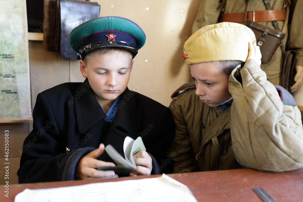 Children in uniform of red army with document Stock Photo | Adobe Stock