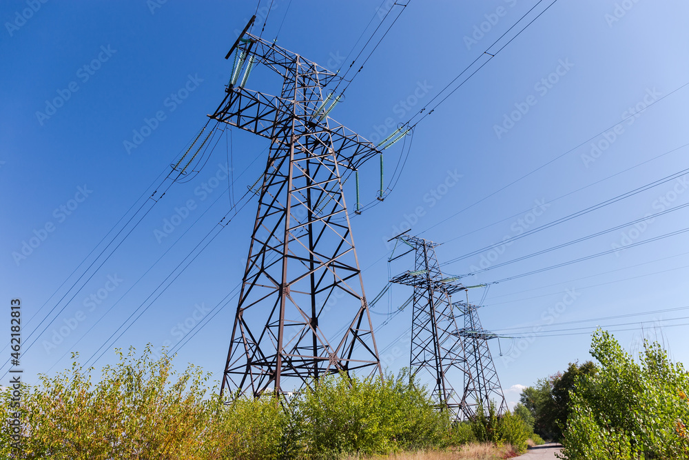 Lattice steel anchor transmission towers of overhead power lines Stock ...