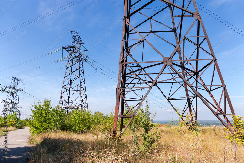 Lattice steel anchor transmission towers of overhead power lines Stock ...