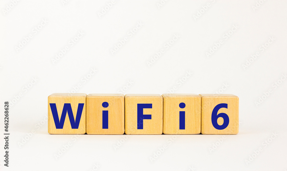 WiFi 6 symbol. The concept word WiFi 6 on wooden cubes. Beautiful white ...