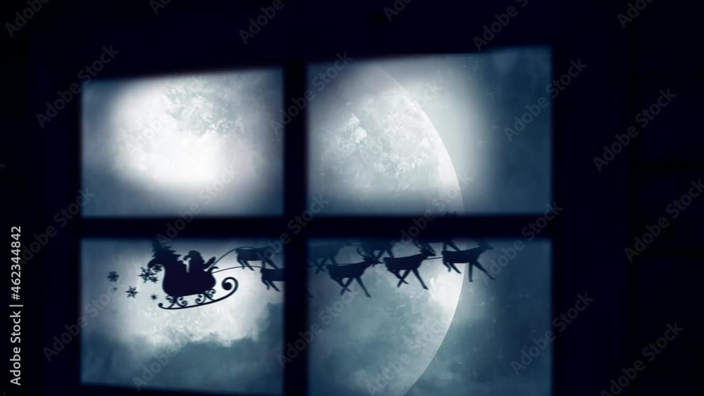 Window frame over santa claus in sleigh being pulled by reindeers ...