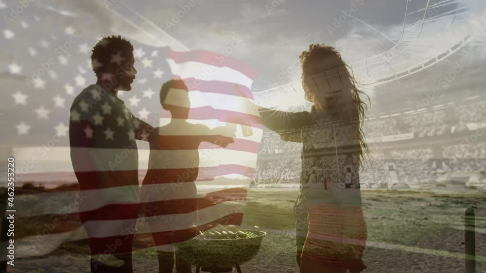 Animation of waving flag of usa over group of friends having fun on the ...