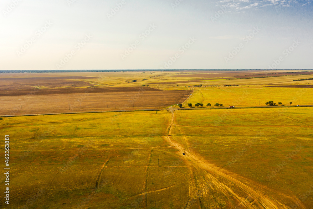 steppe landscape ravines roads from the height of a drone flight ...