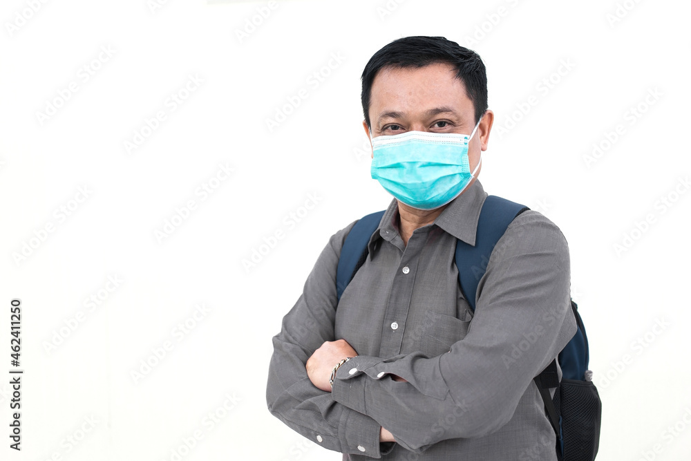 Asian business male wears grey shirt and medical face mask to protect ...